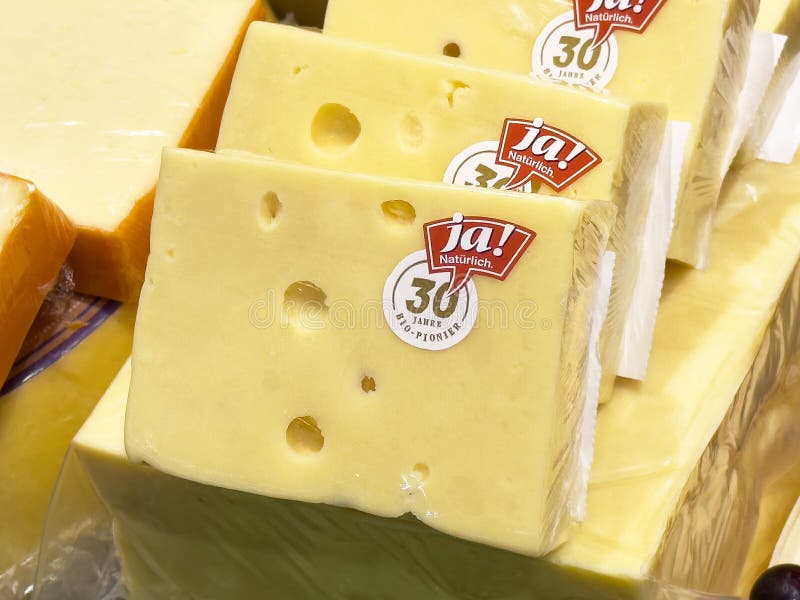Swiss Cheese Blocks with Emmental Holes in Grocery Display Editorial ...