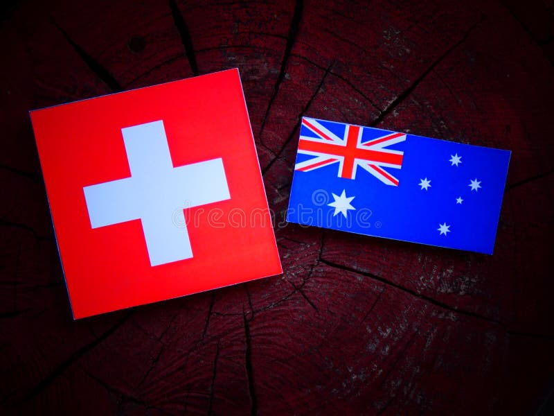 Swiss Flag with Australian Flag on a Tree Stump Stock Image - Image of ...