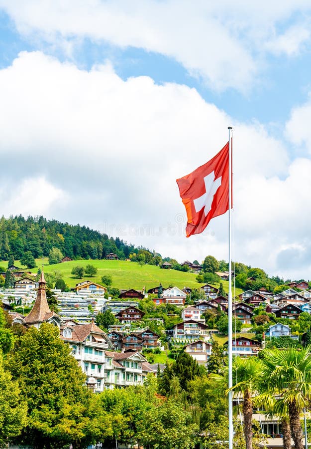 Swiss flag with blue sky stock image. Image of panoramic - 150413801