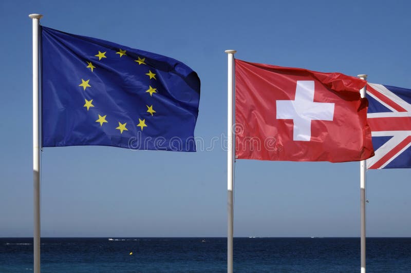 The Swiss National Flag and the Flag of the European Union Stock Photo ...