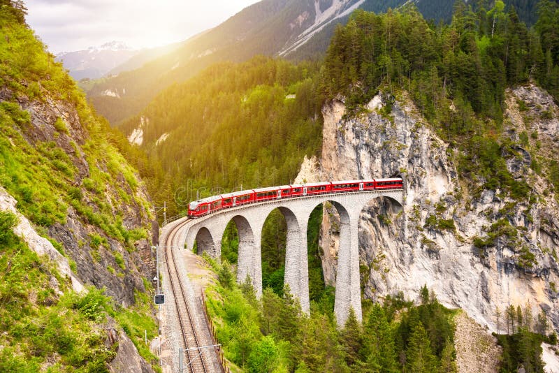 Swiss Red Train on Viaduct in Mountain, Scenic Ride Stock Photo - Image ...