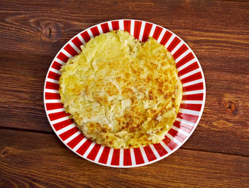 Swiss Roesti cooking stock photo. Image of lunch, plate - 113640074