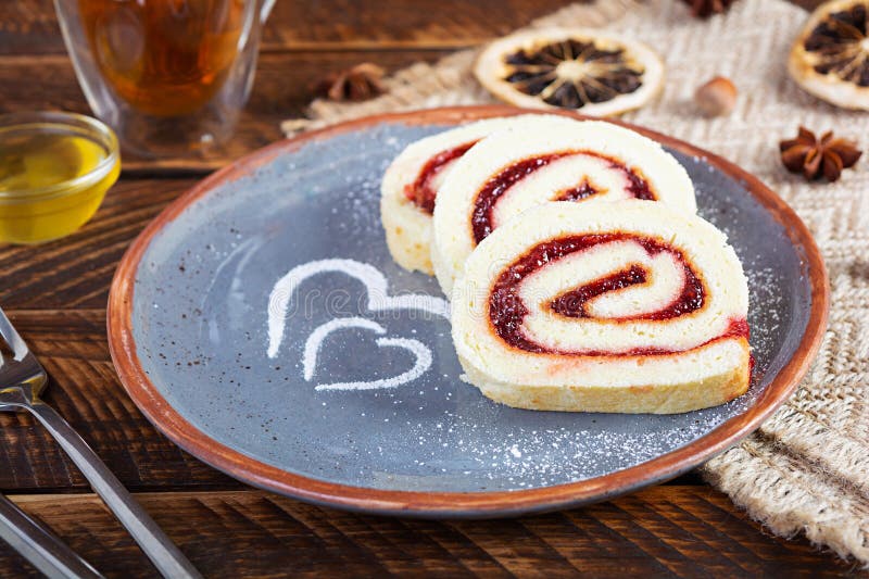 Swiss Roll with Strawberry Jam. Jelly Roll with Decoration Stock Photo ...