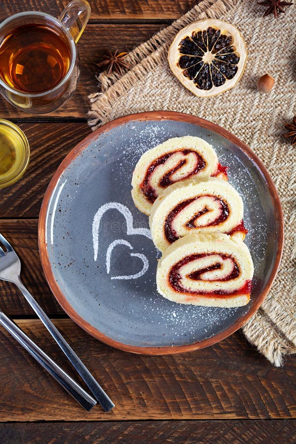 Swiss Roll with Strawberry Jam. Jelly Roll with Decoration Stock Photo ...