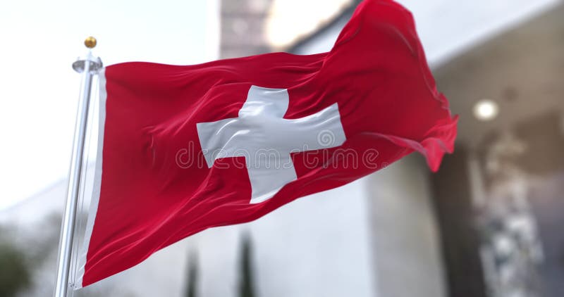 Switzerland Flag Waving on Beautiful Clean Blue Sky Footage Background ...