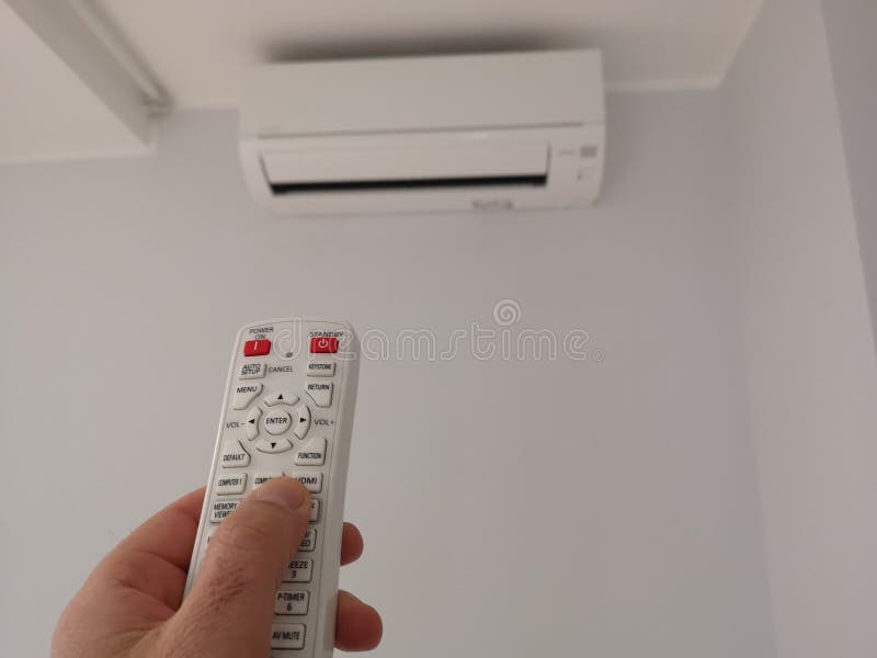 Switch on the Air Conditioner with the Remote Control Stock Image ...