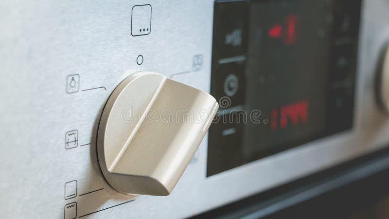 Switch on an electric oven stock image. Image of position - 81422075