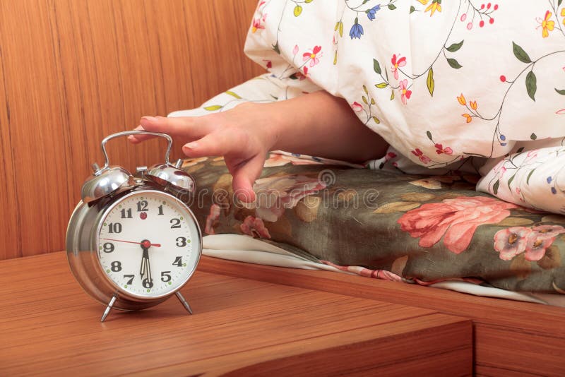 Switch off an alarm clock stock photo. Image of girl - 17074692