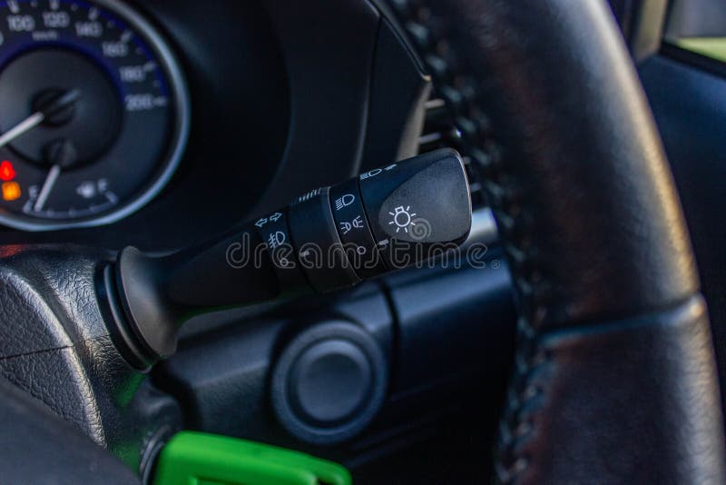 Switch Off Lights in a Car. Close-up Car Integrated Turning Indicator ...