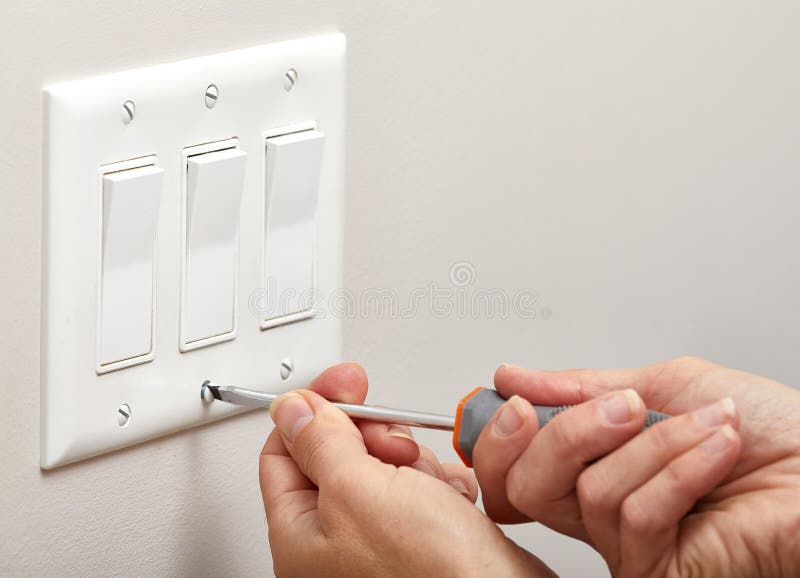 Switch repairing. stock image. Image of turnscrew, people - 78236901