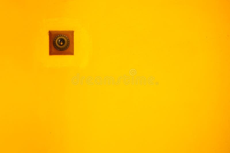 Switch on a yellow wall stock photo. Image of electrical - 58260160