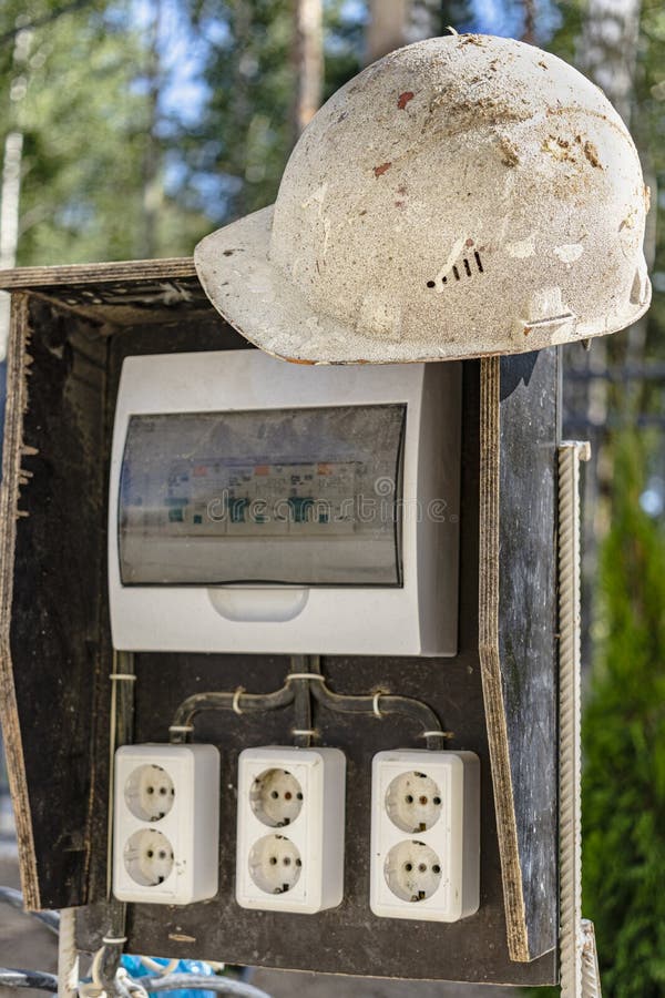A Switchboard on a Construction Site with Sockets and an Old Work ...
