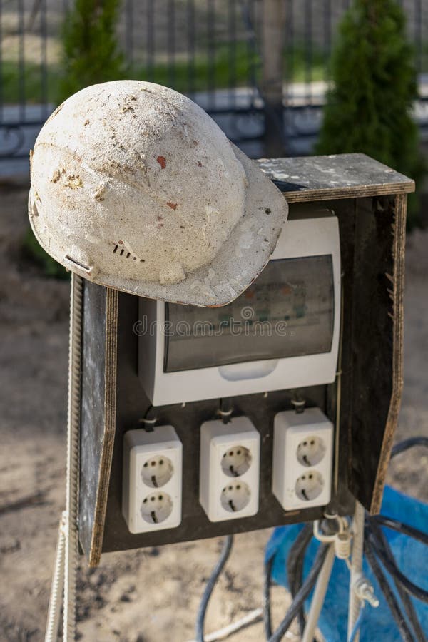 A Switchboard on a Construction Site with Sockets and an Old Work ...