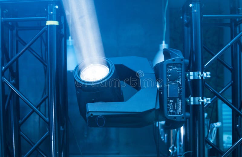 Switched on Stage Lights Under the Blue Light. Light Moving Head for ...