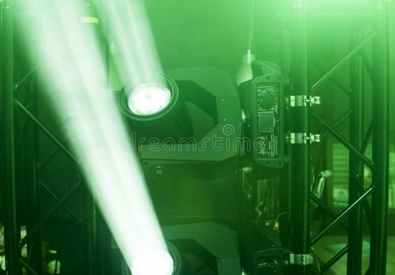 Switched on Stage Lights Under the Green Light. Light Moving Head for ...