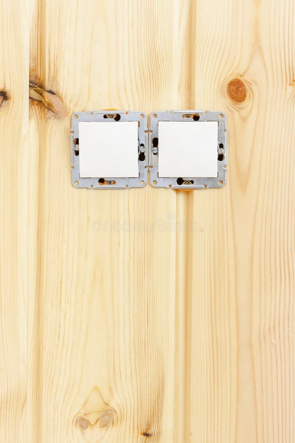 Switches in wooden wall stock photo. Image of rebuild - 26049996