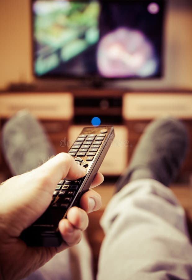 Switching Channels On The TV Stock Photo - Image of hand, studio: 80952904