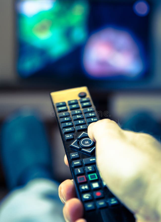 Switching TV channels stock photo. Image of remote, watching - 47599234