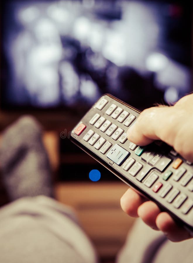 Switching TV channels stock photo. Image of watching - 47599234