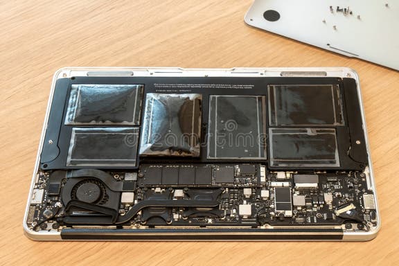 Swollen Battery of Broken Laptop in Open Casing Closeup Stock Image ...