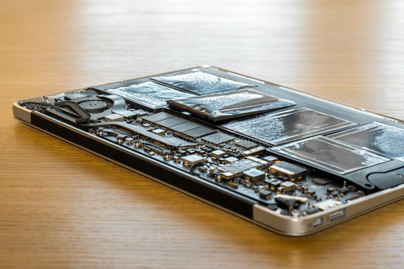 Swollen Battery of Broken Laptop in Open Casing Closeup Stock Photo ...