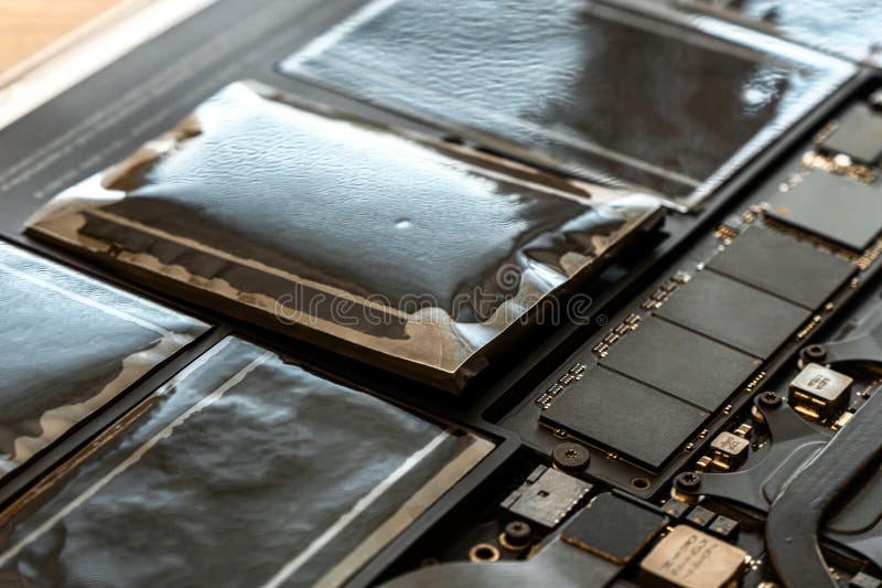 Swollen Battery of Broken Laptop in Open Casing Closeup Stock Image ...