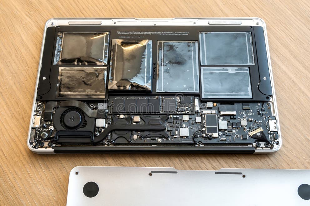 Swollen Battery of Broken Laptop in Open Casing Closeup Stock Image ...