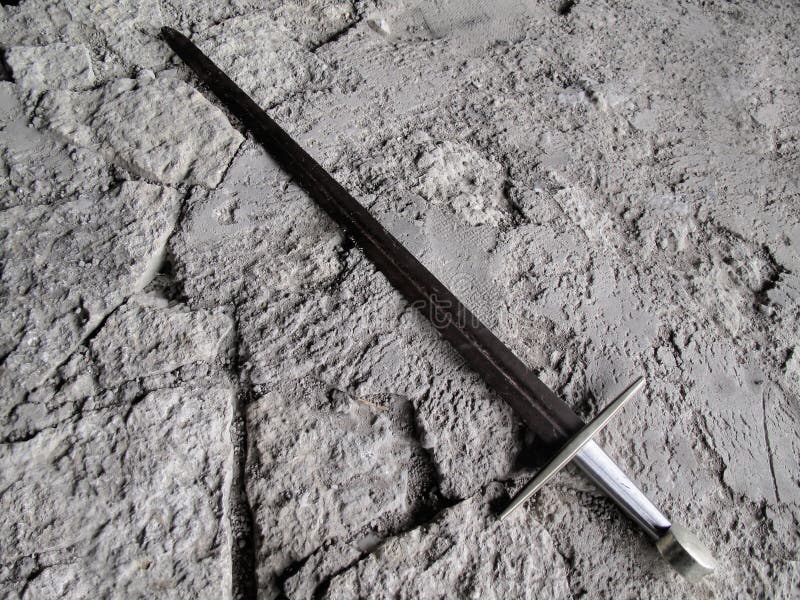Sword on Gravel Dirt Background Stock Image - Image of material, stone ...