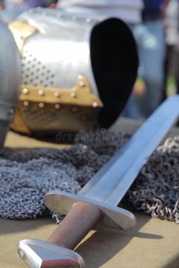 Sword, armor and helmet stock image. Image of armour - 76884219