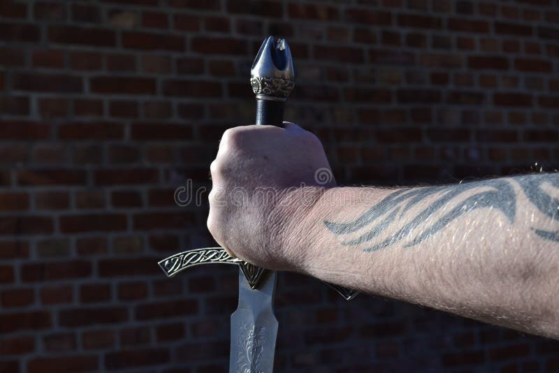 Sword in hand stock photo. Image of viking, hand, power - 67417420