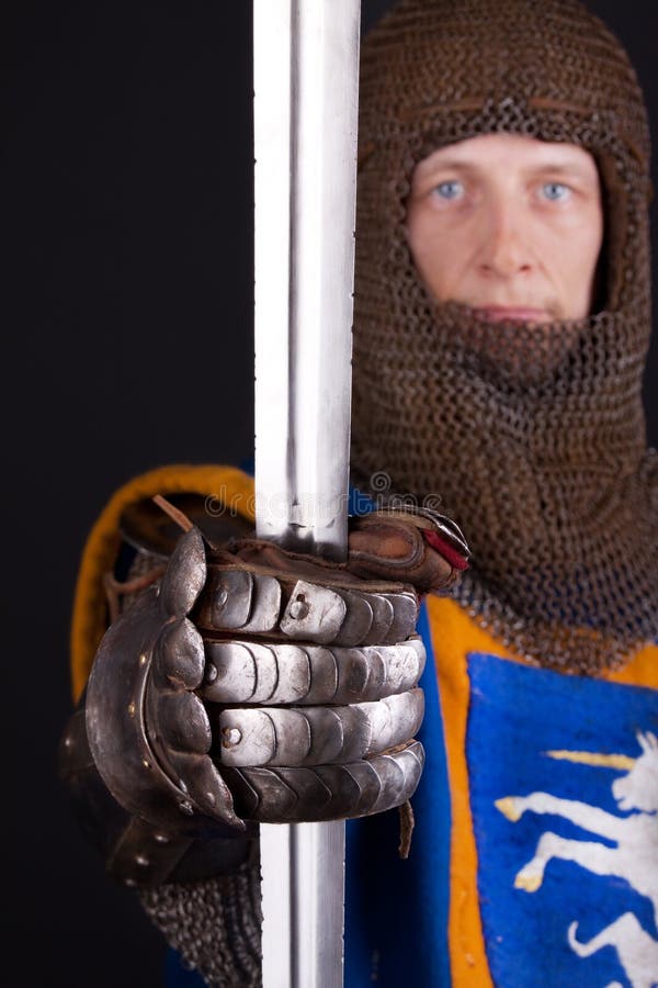 Knight holding a sword stock photo. Image of fighter - 13314004