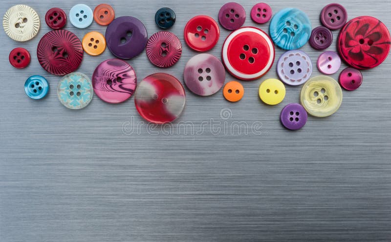 Sy knapptygbakgrund arkivfoto. Bild av knappar, kläder - 47656444