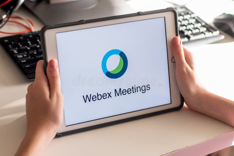 Hands Holding a Tablet with Webex Cloud Meetings Application Editorial ...