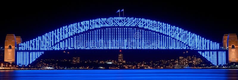 Sydney Harbour Bridge Illuminated in a Grid Pattern of Brilliant Blue ...