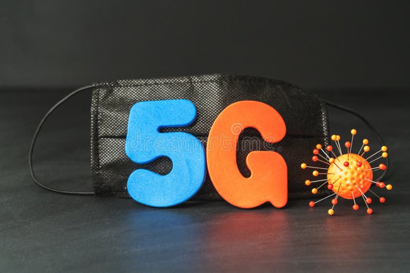 Symbol of Coronavirus and 5g Network Next To a Medical Mask. the Effect ...