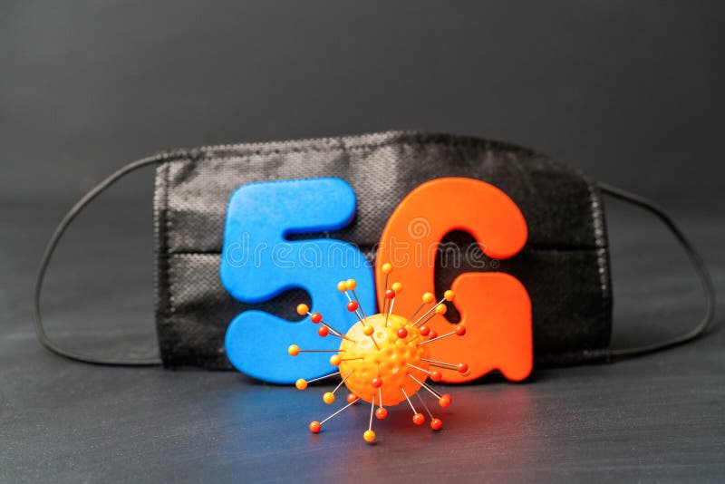 Symbol of Coronavirus and 5g Network Next To a Medical Mask. the Effect ...
