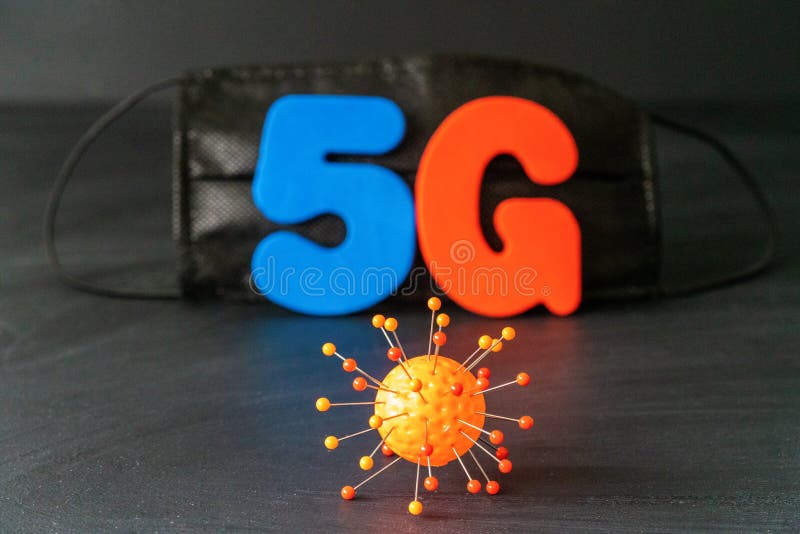 Symbol of Coronavirus and 5g Network Next To a Medical Mask. the Effect ...