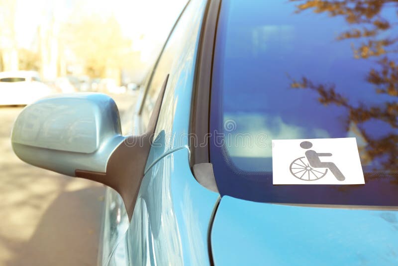 Symbol of Handicapped on Car Windshield, Stock Image - Image of ...