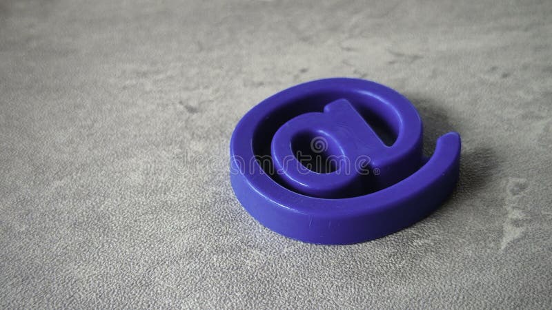 At Symbol Isolated on Gray Surface Stock Photo - Image of information ...