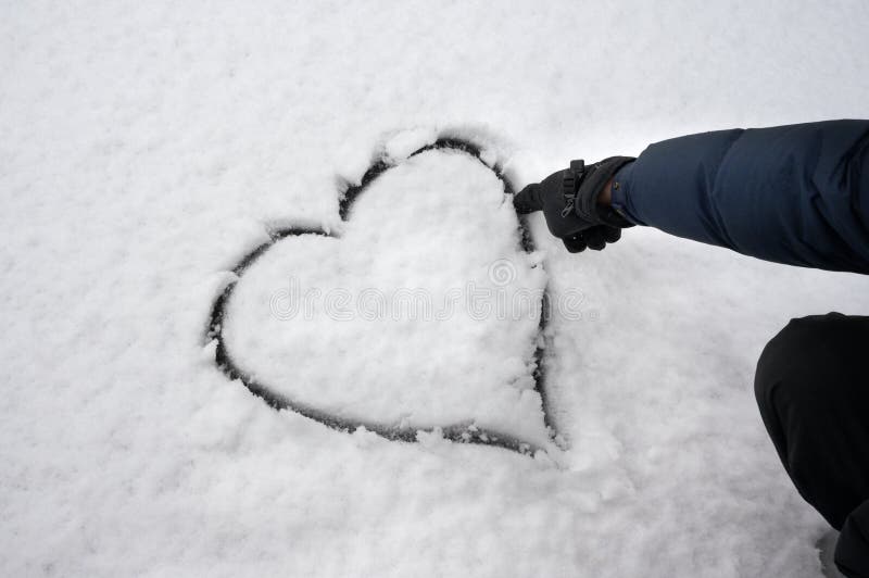 Symbol of Love on Snow. Person Drawing Heart Shape on Snow Stock Image ...