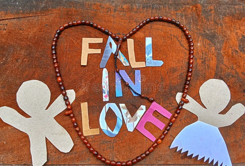 A Symbol of Love with the Words Falling in Love Stock Image - Image of ...