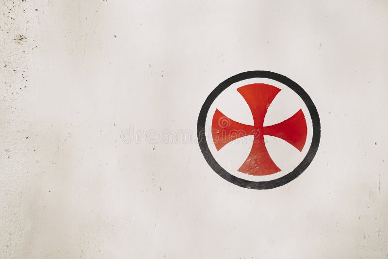 Symbol of a Red Cross in a Black Circle Painted on a Wall Stock Image ...
