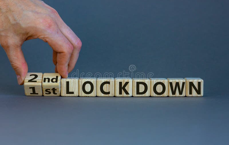 Symbol for a Second Lockdown. Hand Turns Cubes and Changes the ...
