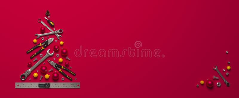 A Symbolic Christmas Tree Made of Construction Tools on a Red ...