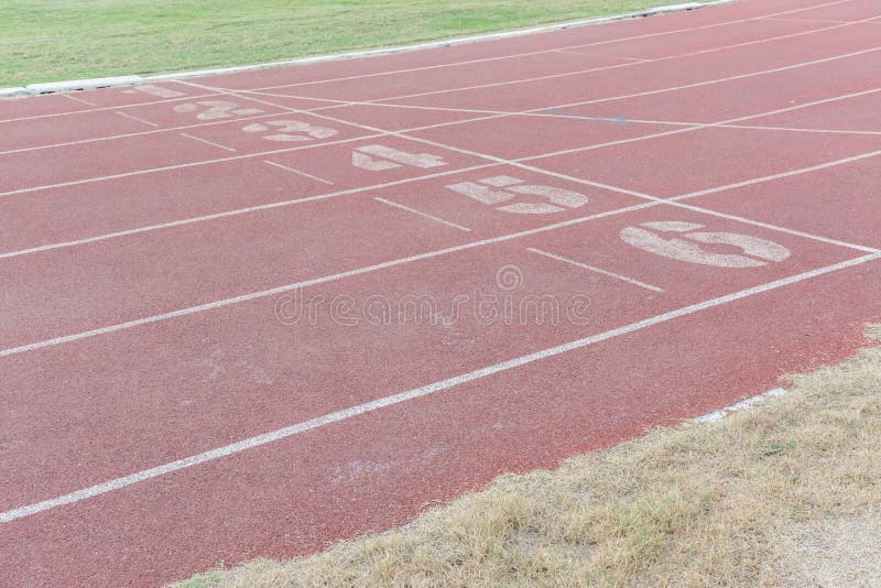 Symbols on running track stock photo. Image of competition - 68159676