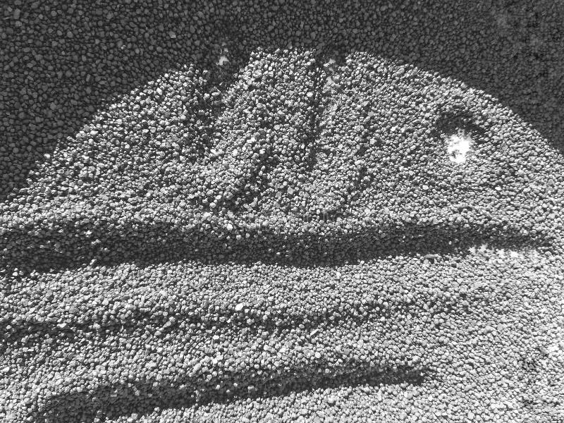 Symbols in the sand stock image. Image of shadow, textured - 103478399