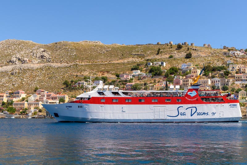 Sea Dreams Ferry in the Port of Symi Island. Dodecanese, Greece ...