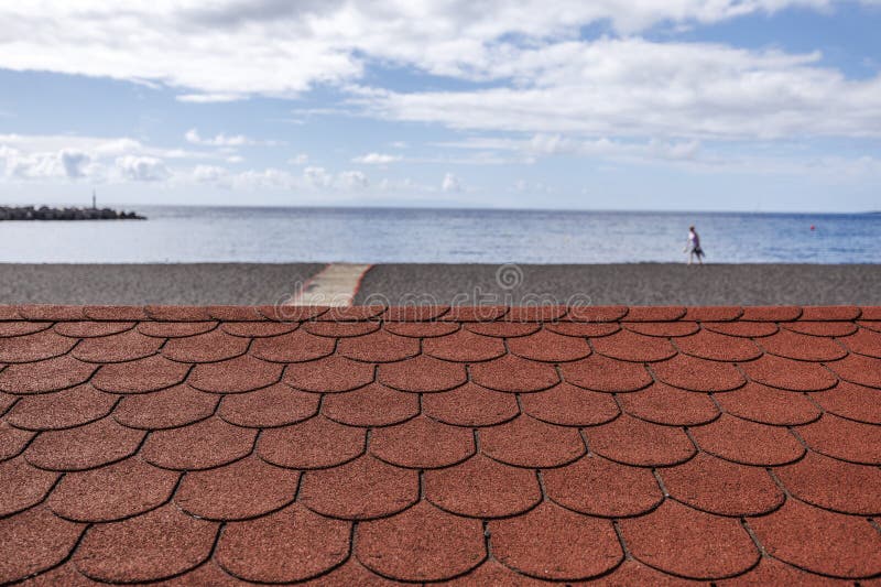 Minimal Beach Scene with Rooftop Foreground and Early Summer Seaside ...
