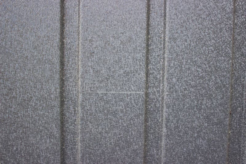 Symmetrical Frosted Patterns on a Cold Metal Surface Stock Photo ...