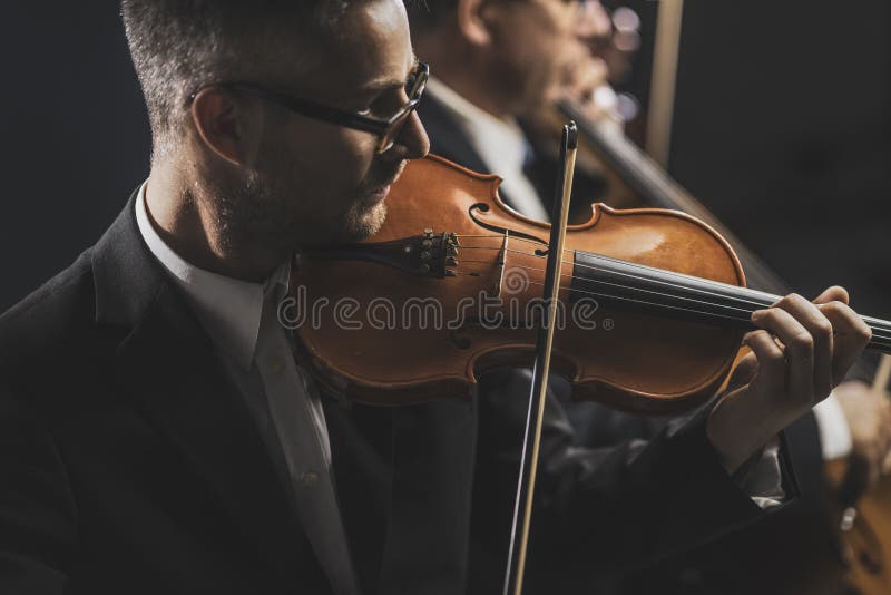 Symphonic String Orchestra Performing on Stage Stock Photo - Image of ...